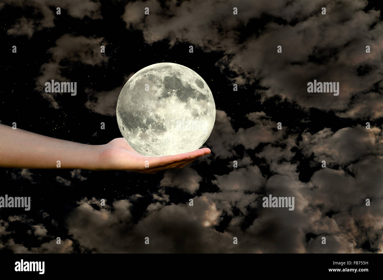 Hand full moon hi-res stock photography and images - Alamy