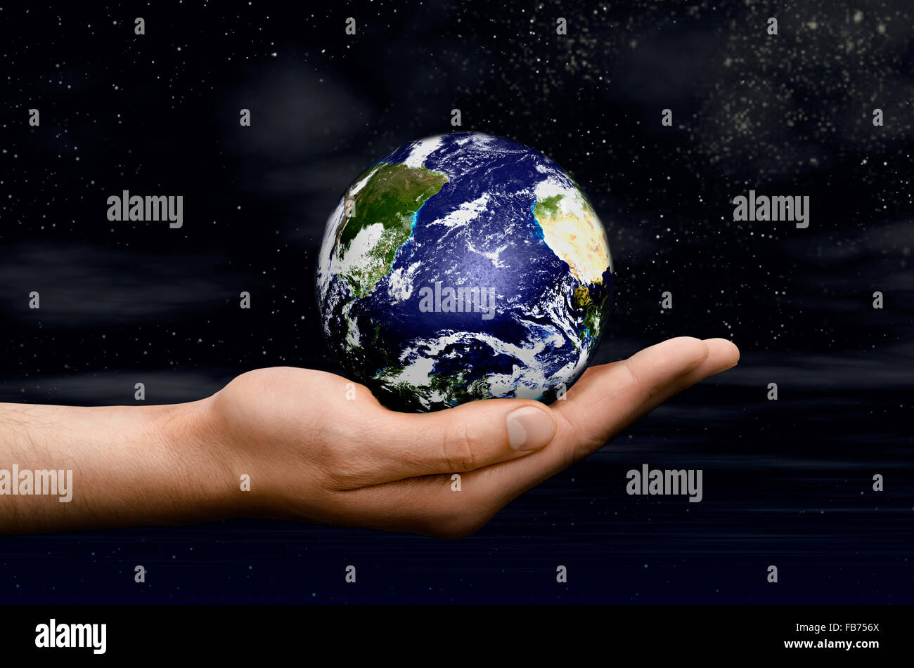 Planet on hands hi-res stock photography and images - Alamy