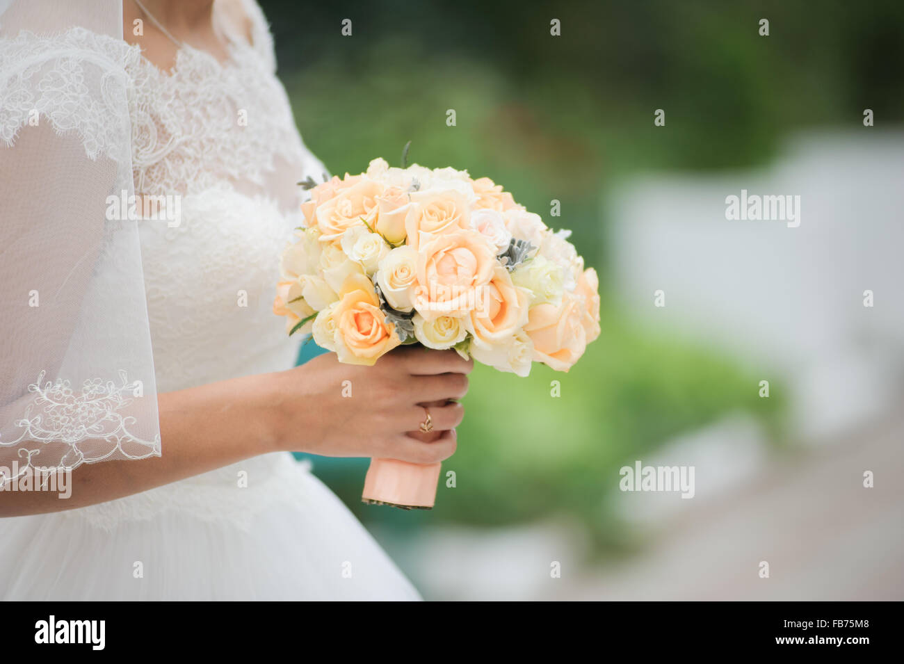 Bride holding a bouquet of flowers, wedding bouquet Stock Photo - Alamy