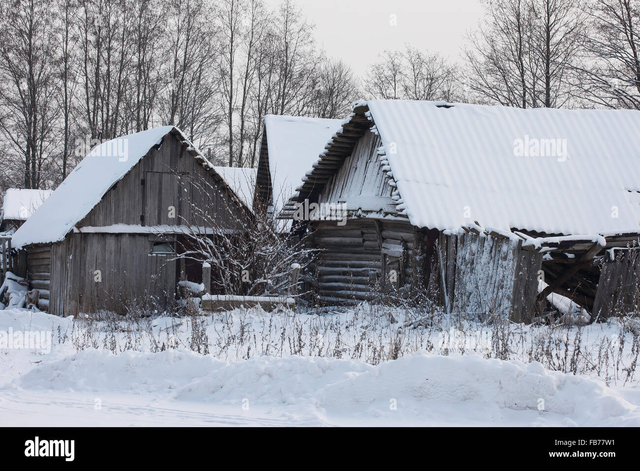 the old wooden buildings covered with snow in winter Stock Photo - Alamy
