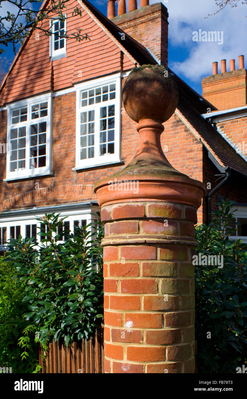 A round brick post with a finial on a corner in Bedford Park, London ...