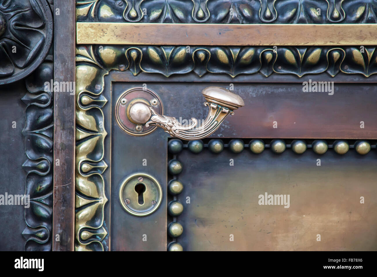 bronze metal antique door handle closeup Stock Photo - Alamy