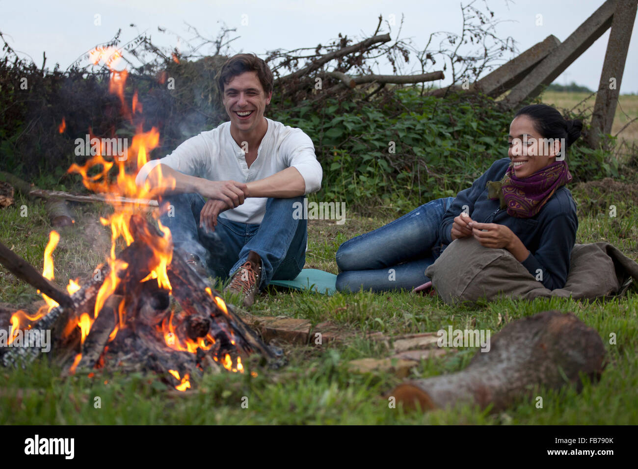 Two men sitting on fire hi-res stock photography and images - Alamy
