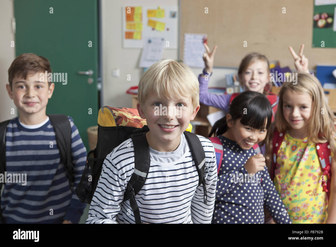 Students having fun together in classroom Stock Photo - Alamy
