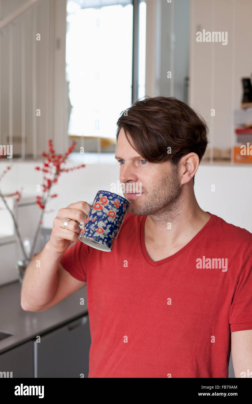 Man drinking coffee Stock Photo - Alamy