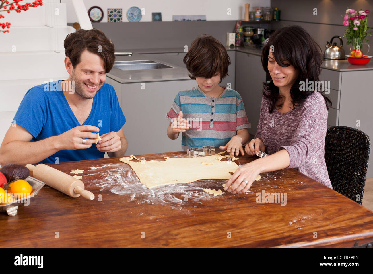 Mother and son at christmas table hi-res stock photography and images ...