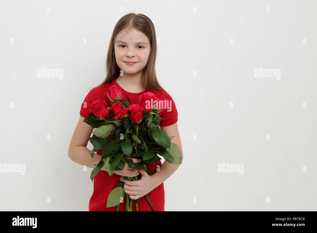 Little girl and red rose Stock Photo - Alamy