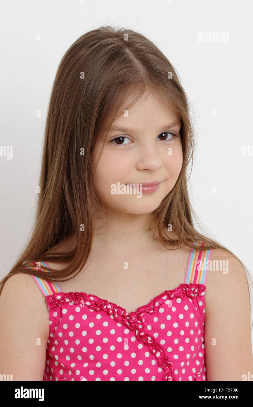 Smiley little girl in summer sun dress Stock Photo - Alamy
