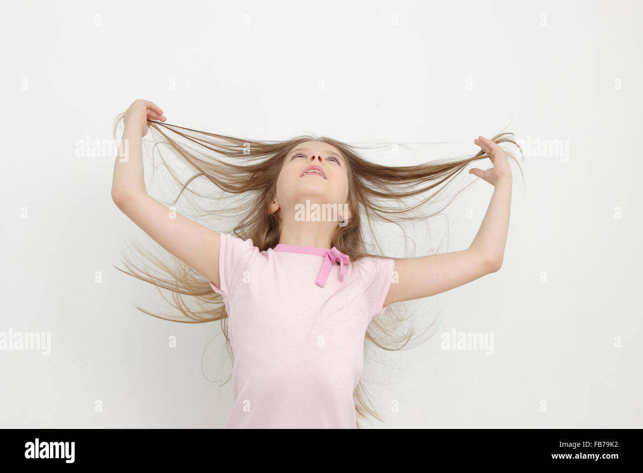 Smiley little girl in summer sun dress Stock Photo - Alamy