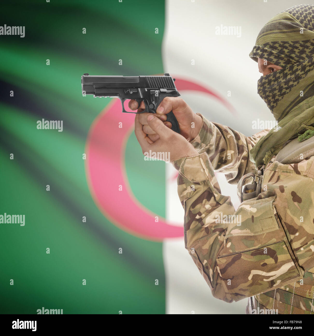 Man with gun in hand and national flag on background series - Algeria ...