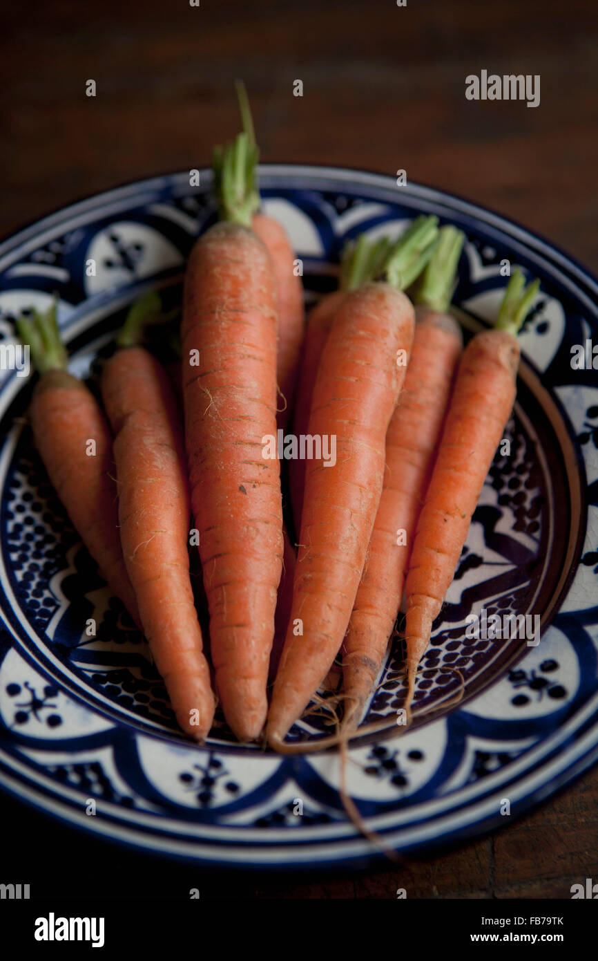 Still life carrot on plate hi-res stock photography and images - Alamy