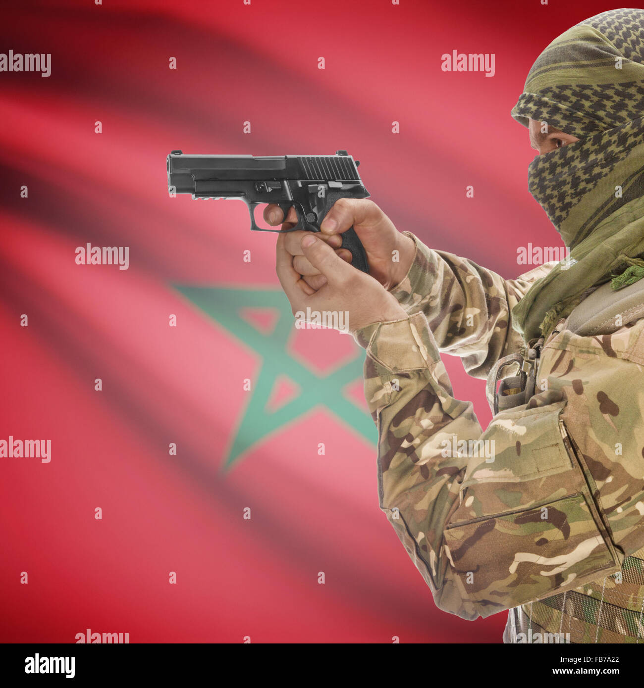 Man with gun in hand and national flag on background series - Morocco ...