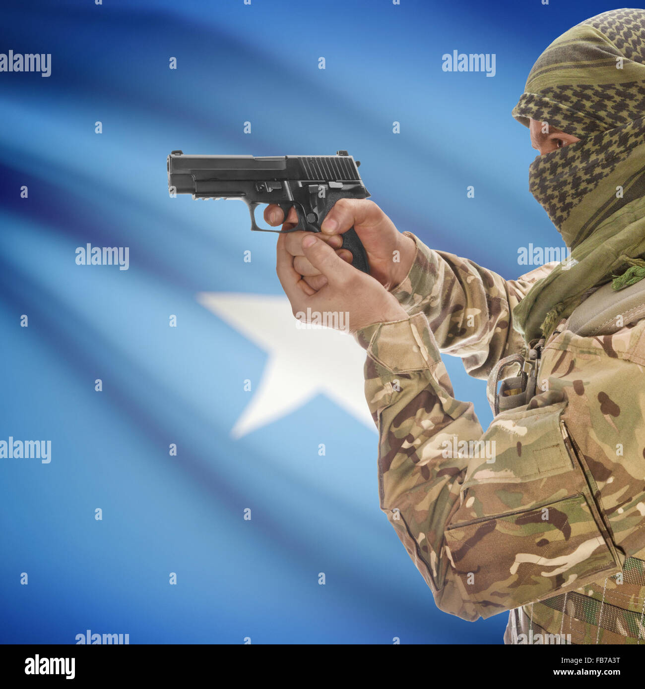 Man with gun in hand and national flag on background series - Somalia ...
