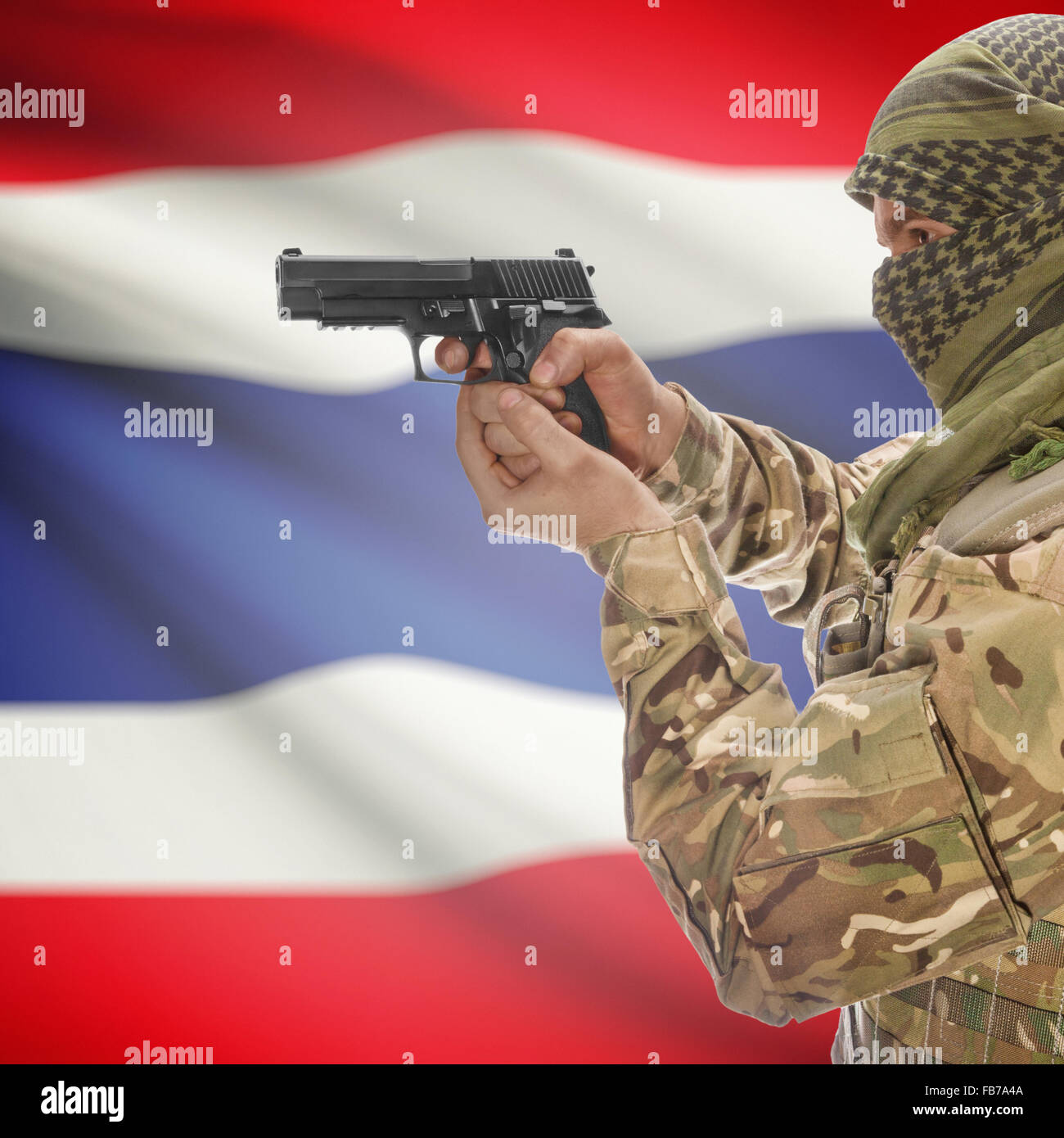 Man with gun in hand and national flag on background series - Thailand ...
