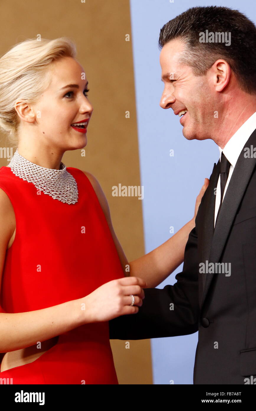 Actress Jennifer Lawrence and producer Simon Kinberg pose in the press ...