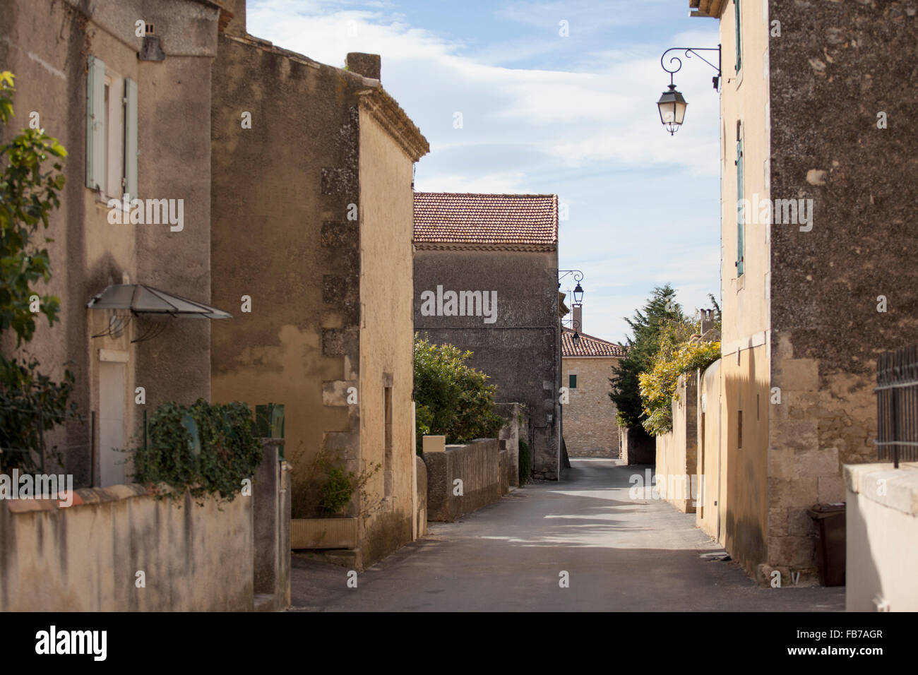 Empty street amidst buildings hi-res stock photography and images - Alamy