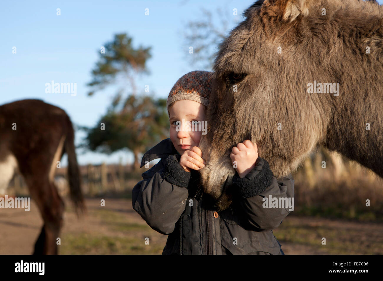 Girl on donkey hi-res stock photography and images - Alamy
