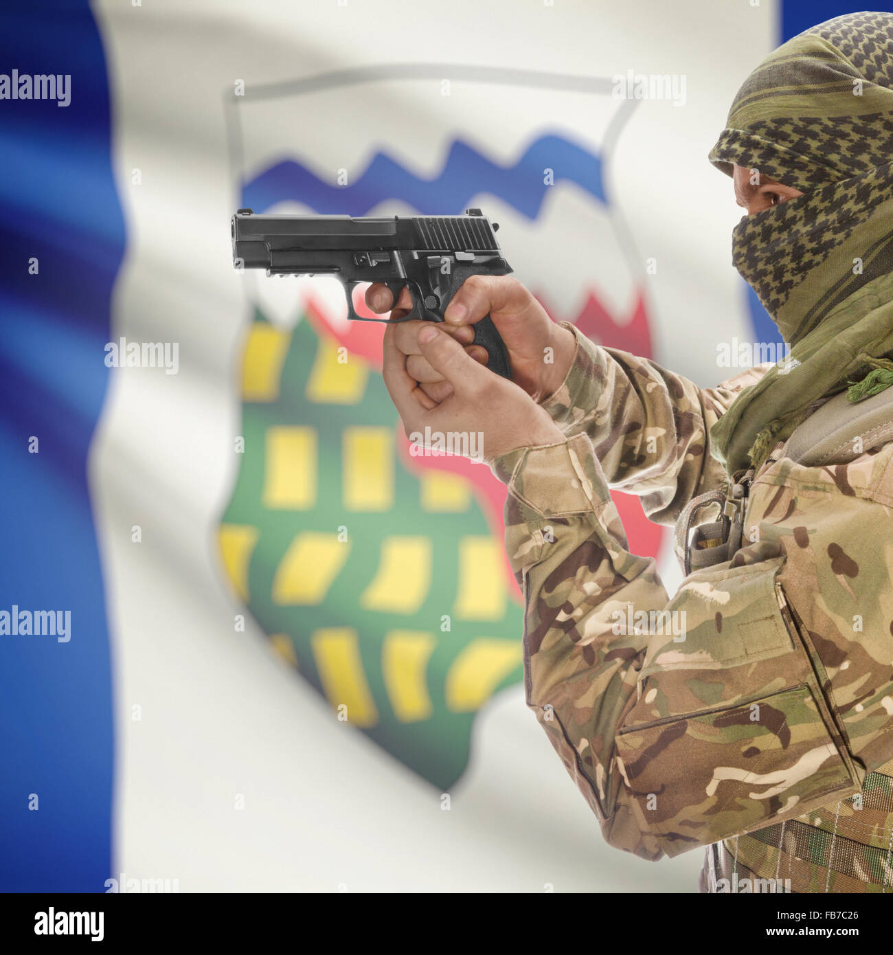 Male with gun in hand and Canadian province flag on background series ...