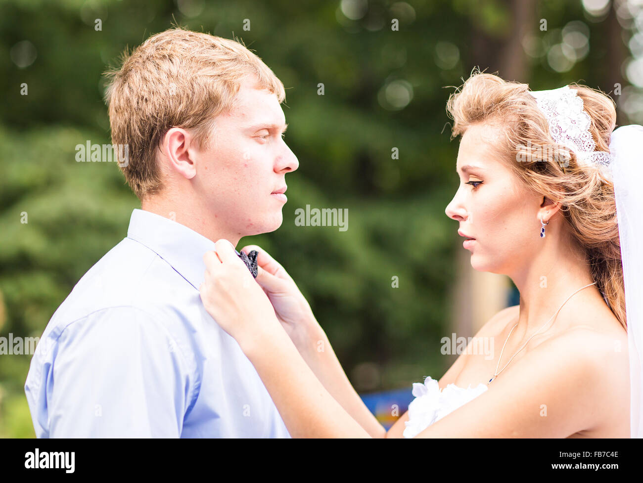 Fixing bow tie hi-res stock photography and images - Alamy