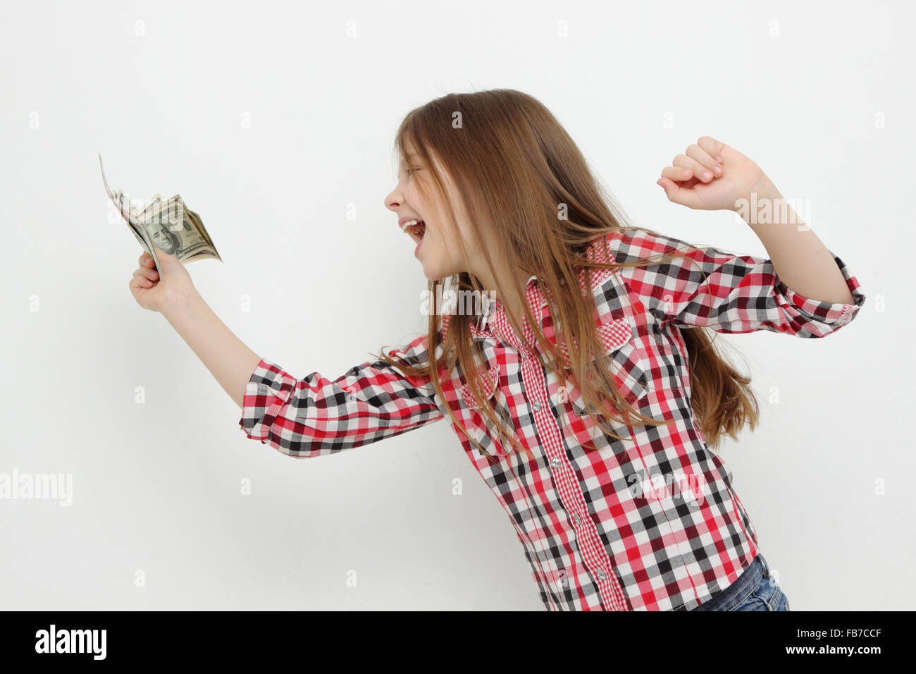 Beautiful kid and cash money Stock Photo - Alamy