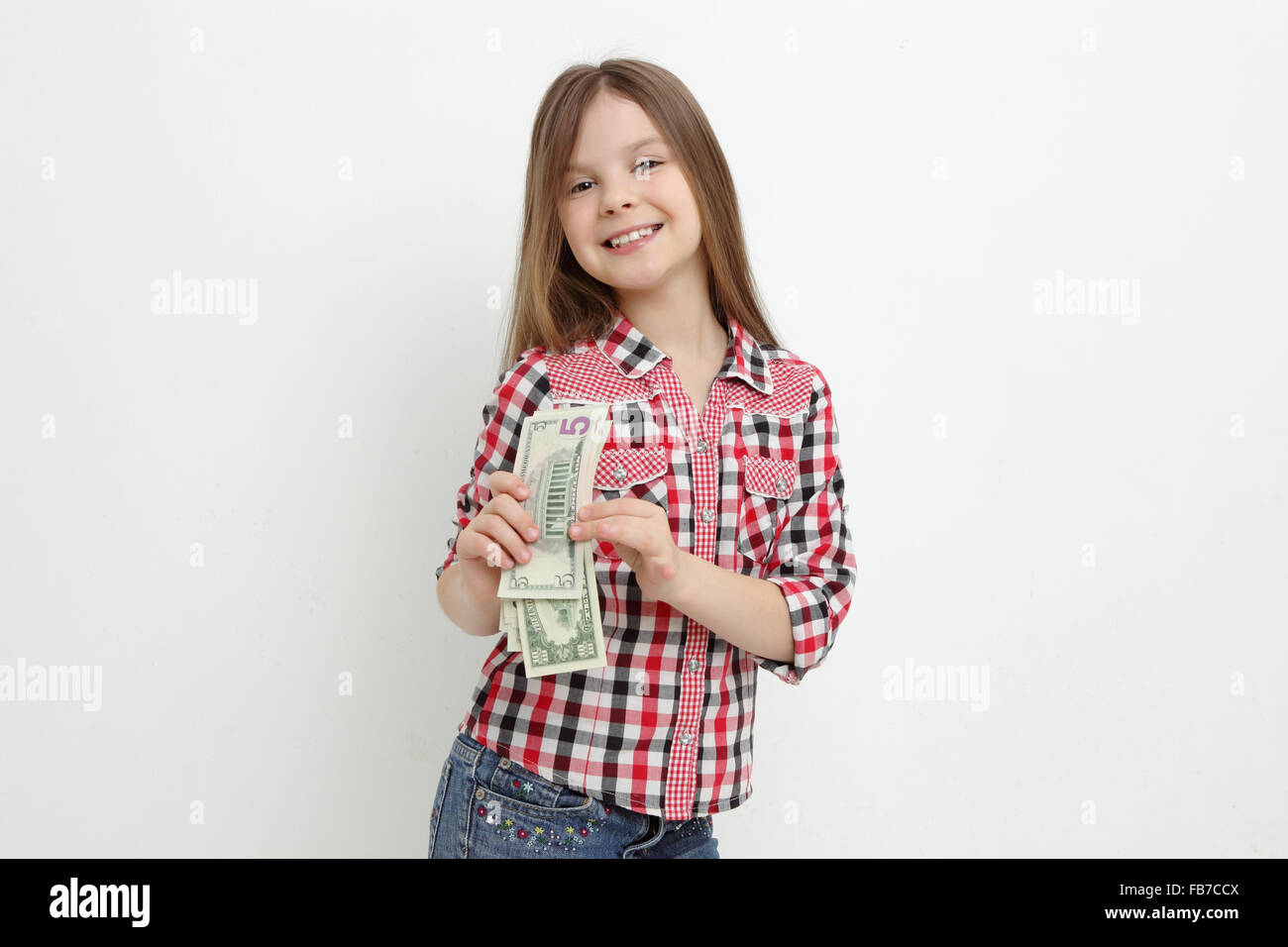 Beautiful kid and cash money Stock Photo - Alamy