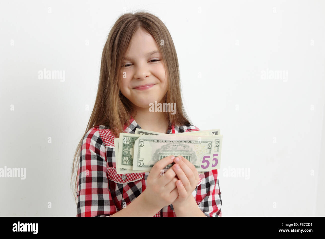 Beautiful kid and cash money Stock Photo - Alamy