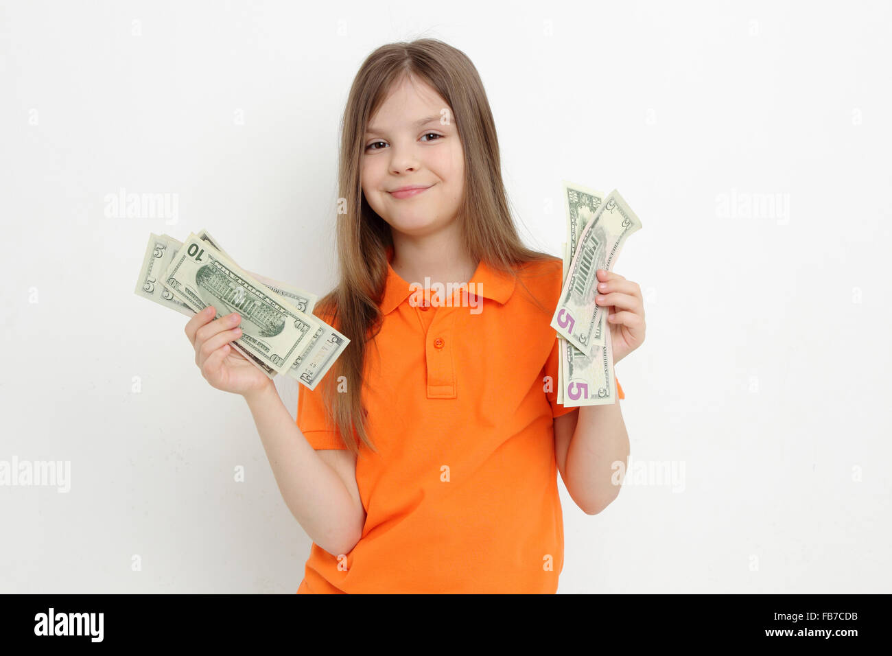 Beautiful kid and cash money Stock Photo - Alamy