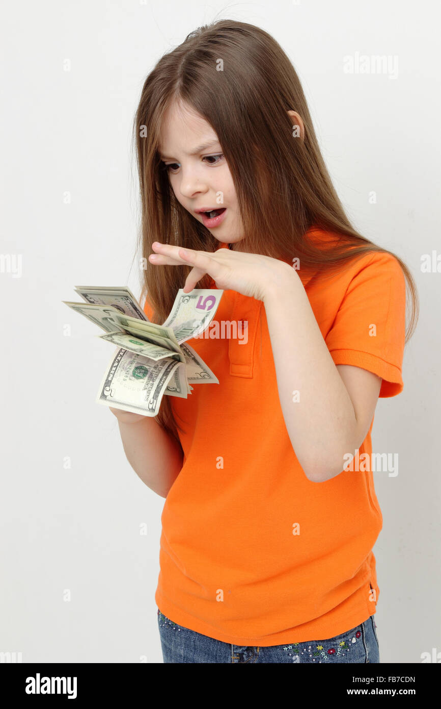 Beautiful kid and cash money Stock Photo - Alamy