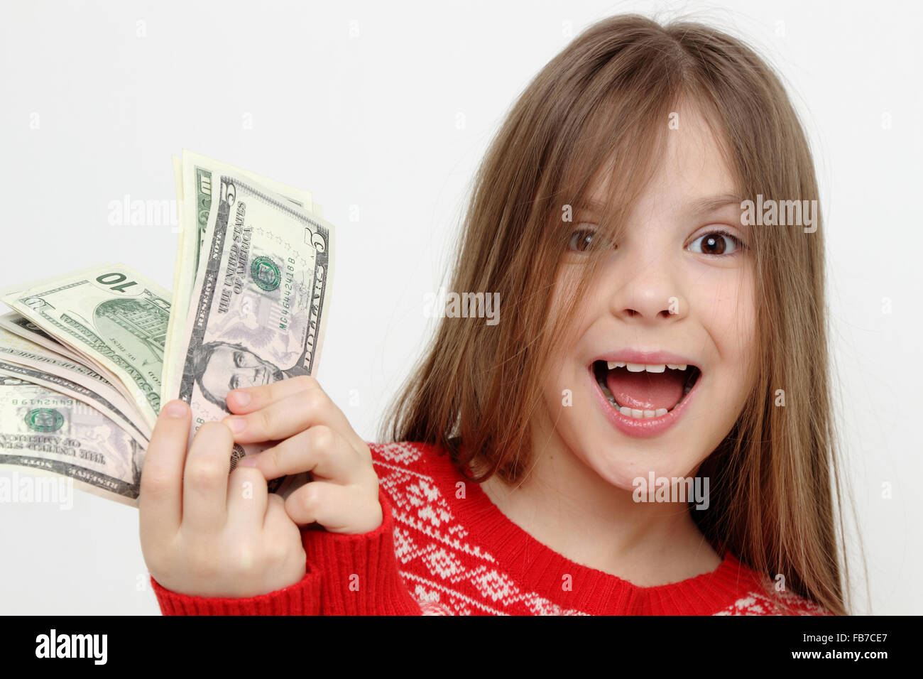 Beautiful kid and cash money Stock Photo - Alamy