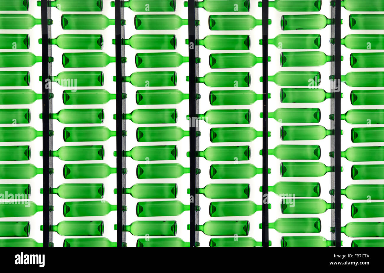 Translucent green bottles pattern with multiple glass bottles in rows ...