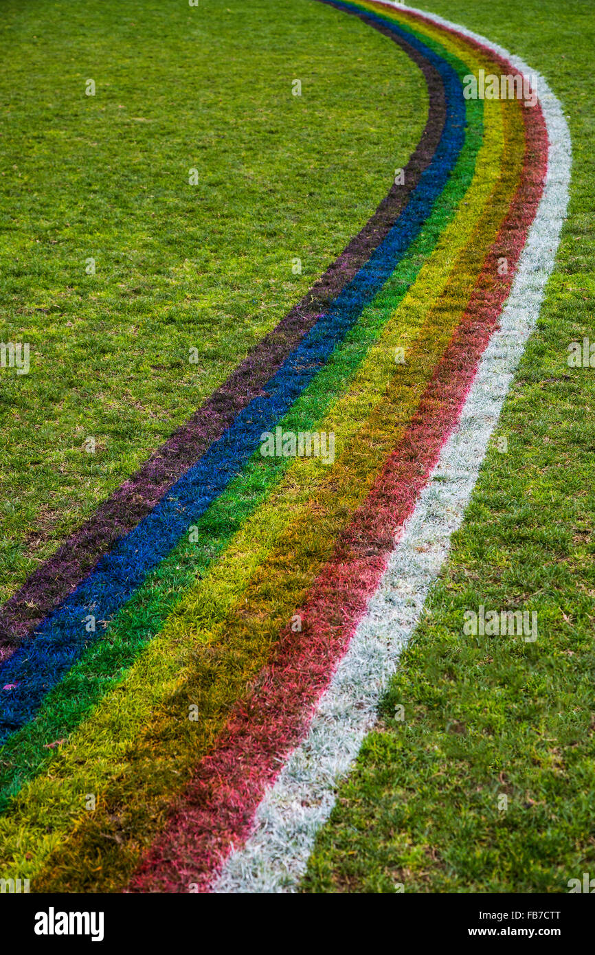 High angle view of rainbow pattern on grassy field Stock Photo - Alamy