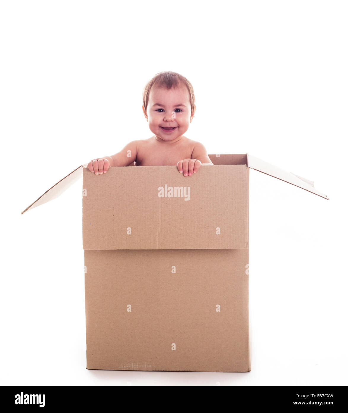 Baby and the box Stock Photo - Alamy