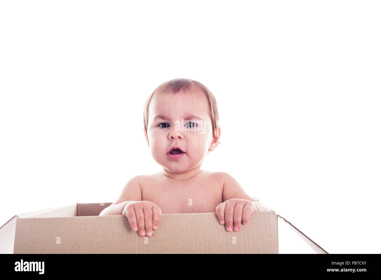 Baby and the box Stock Photo - Alamy