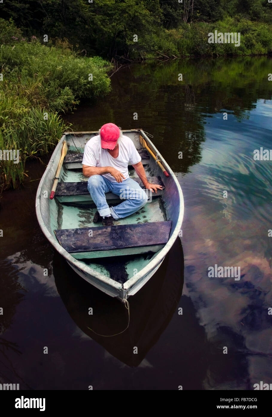 Man in a rowboat hi-res stock photography and images - Alamy