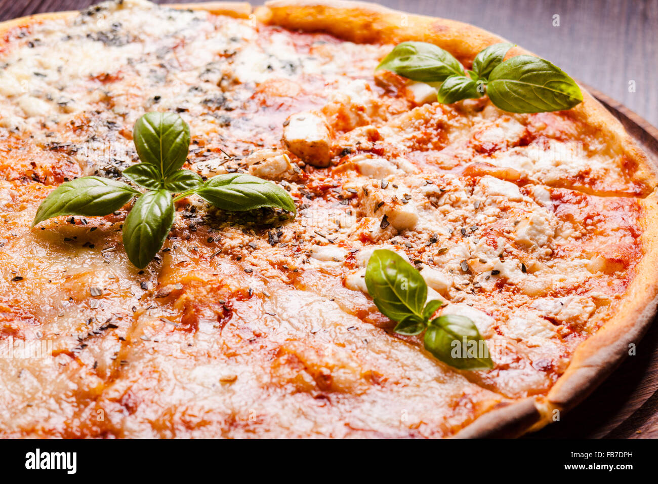 Pizza - four cheeses Stock Photo - Alamy