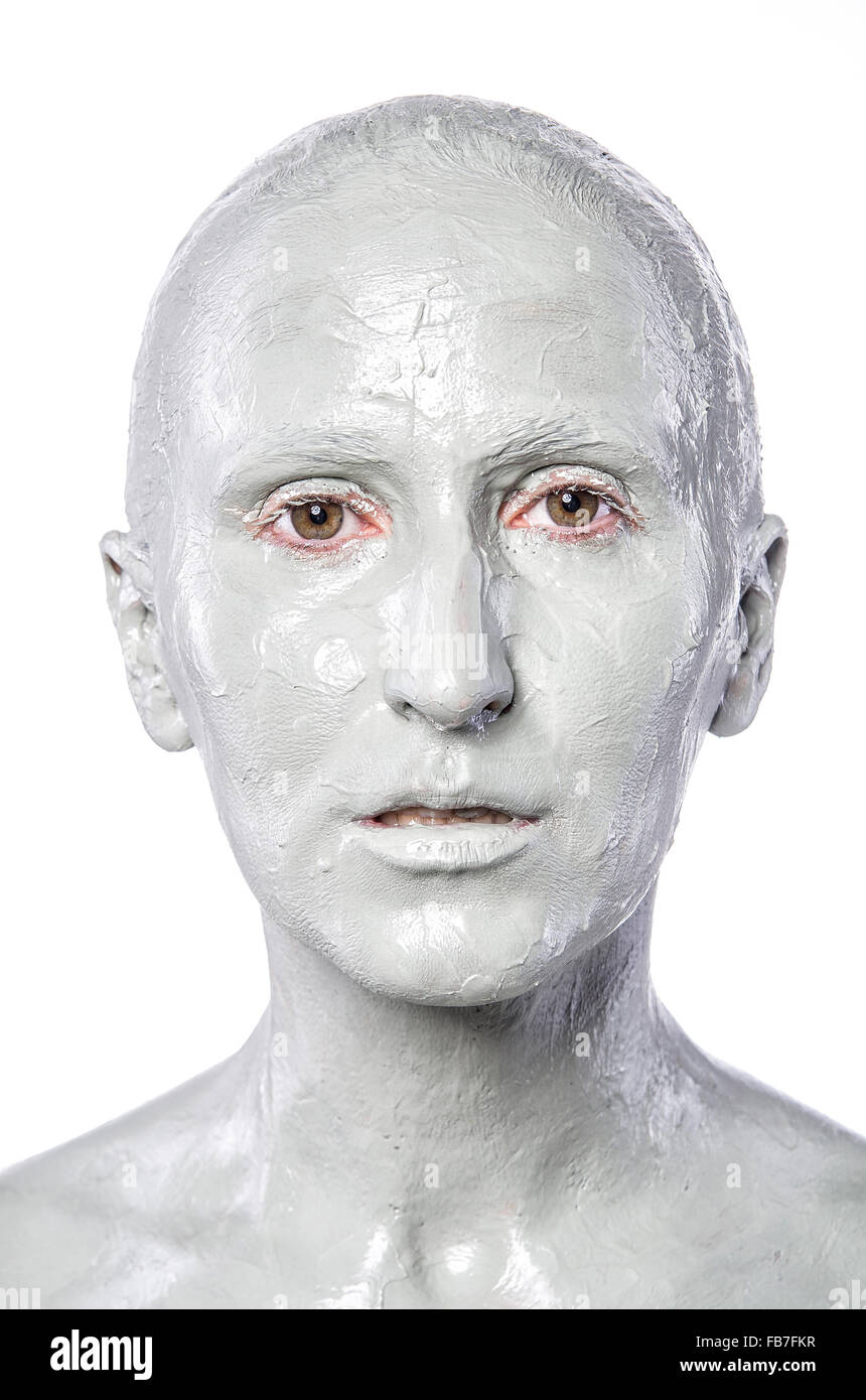 Women face in mud. Scary woman in mud. Spa treatment Stock Photo - Alamy