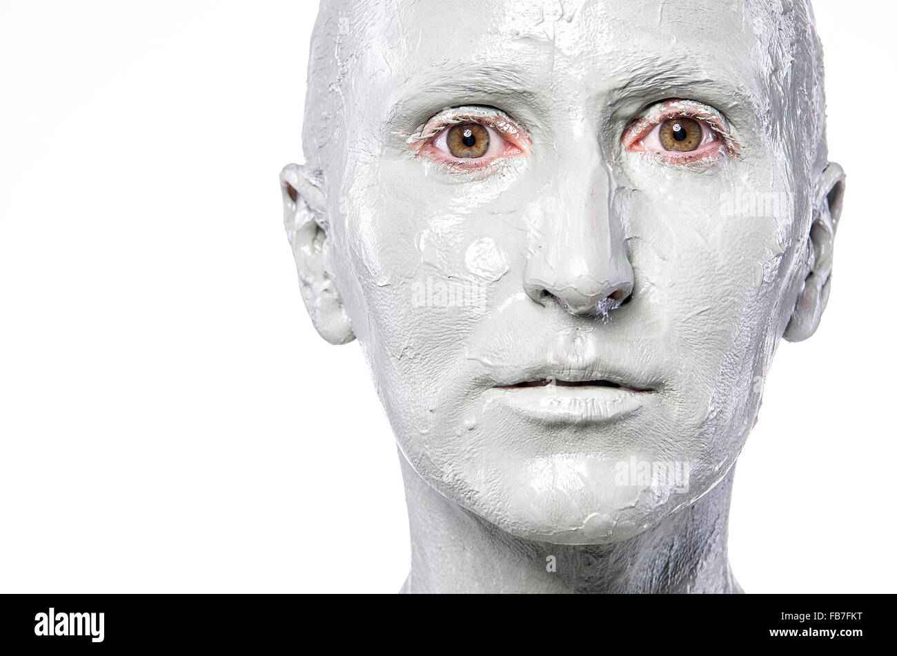 Women face in mud. Scary woman in mud. Spa treatment Stock Photo - Alamy