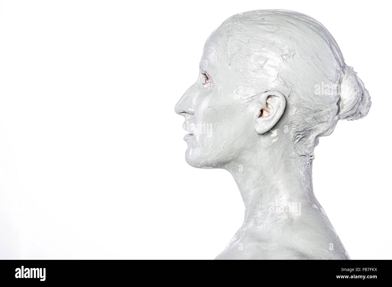 Women face in mud. Scary woman in mud. Spa treatment Stock Photo - Alamy