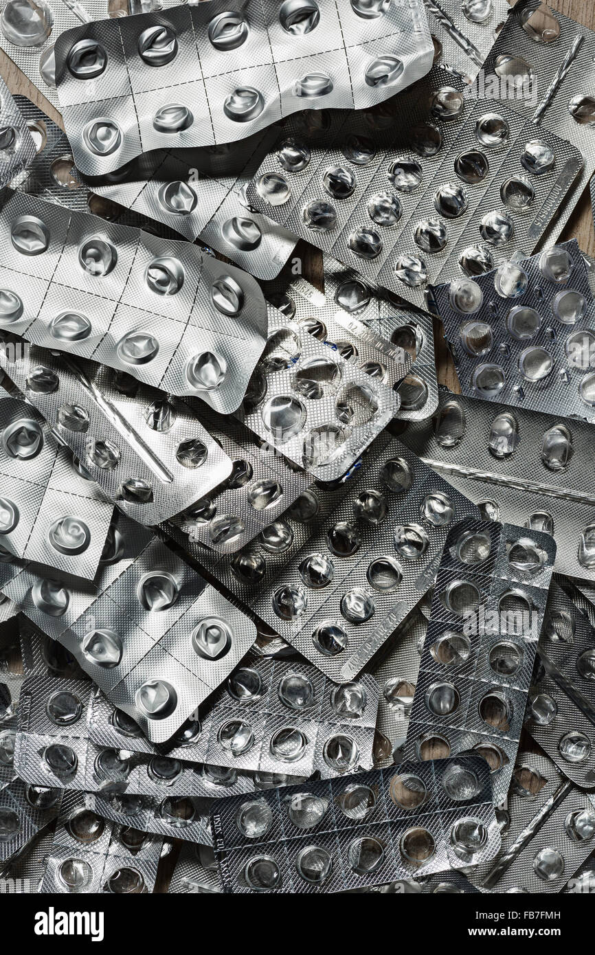 Full frame shot of empty blister packs on table Stock Photo - Alamy