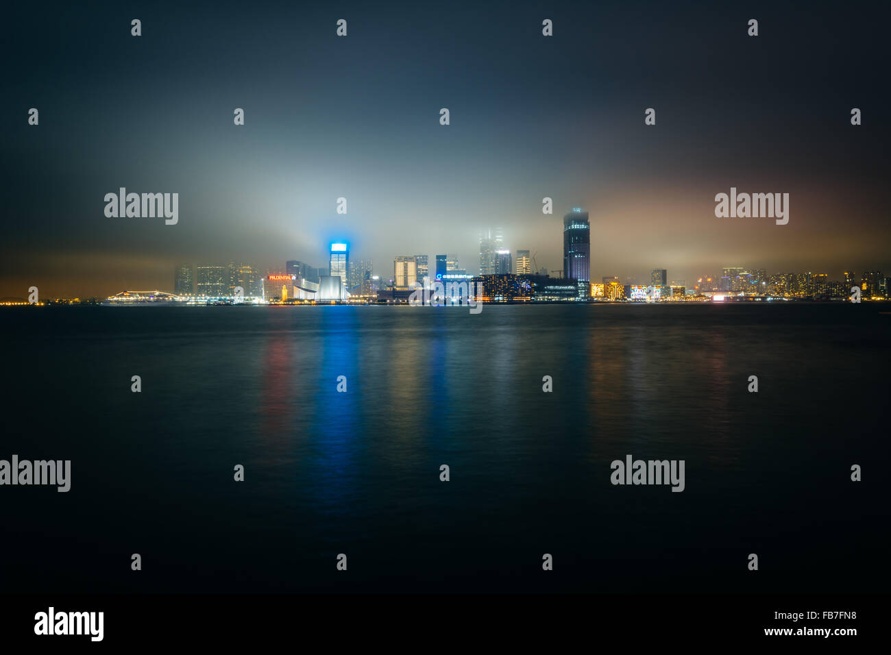View of the skyline of Tsim Sha Tsui at night, seen from the Expo Promenade in Hong Kong, Hong ...