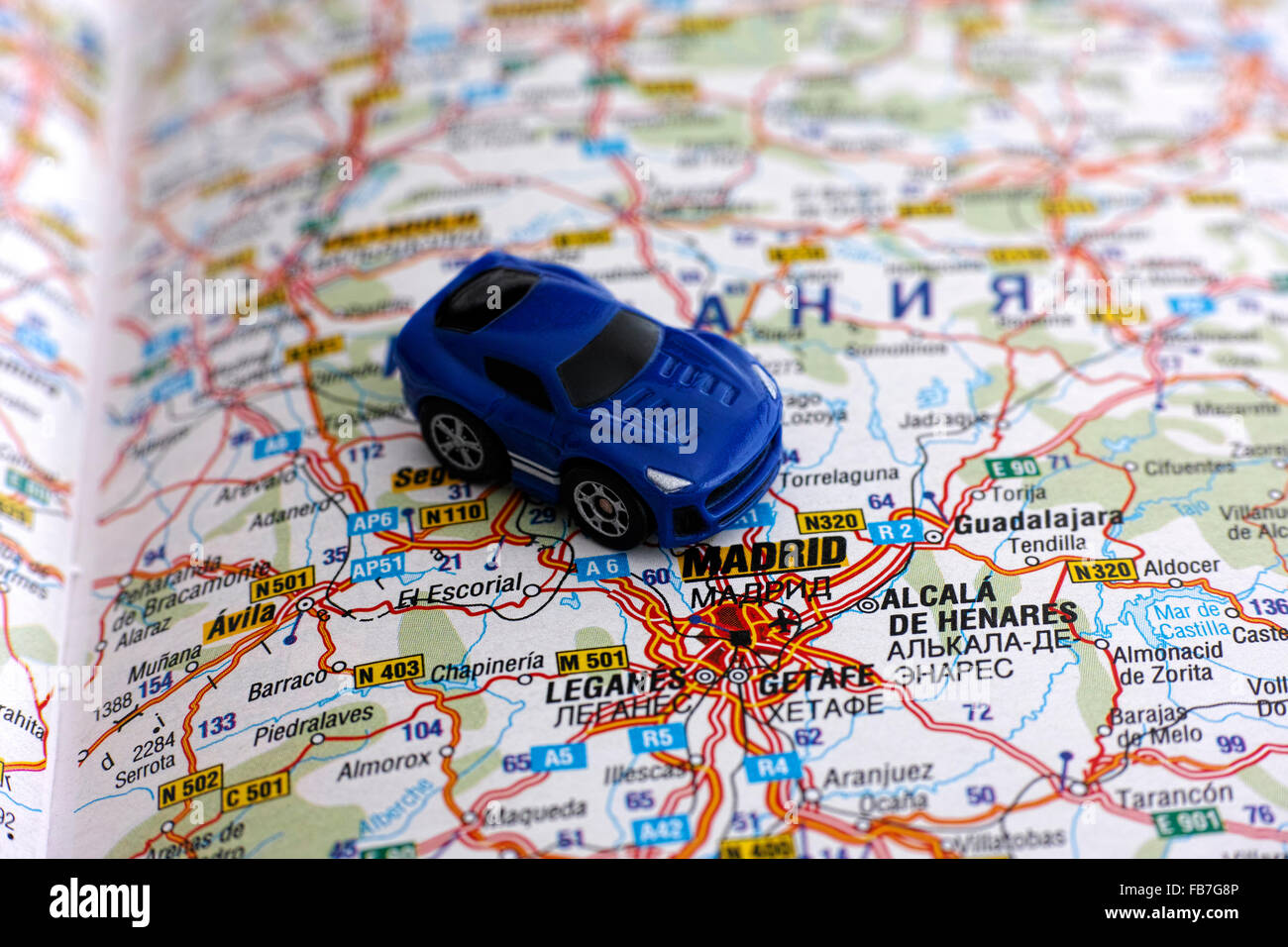 Toy car driving road map hi-res stock photography and images - Alamy