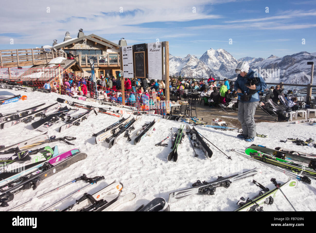 skis left in the snow outside 'Le Panoramic' mountain top restaurant at ...