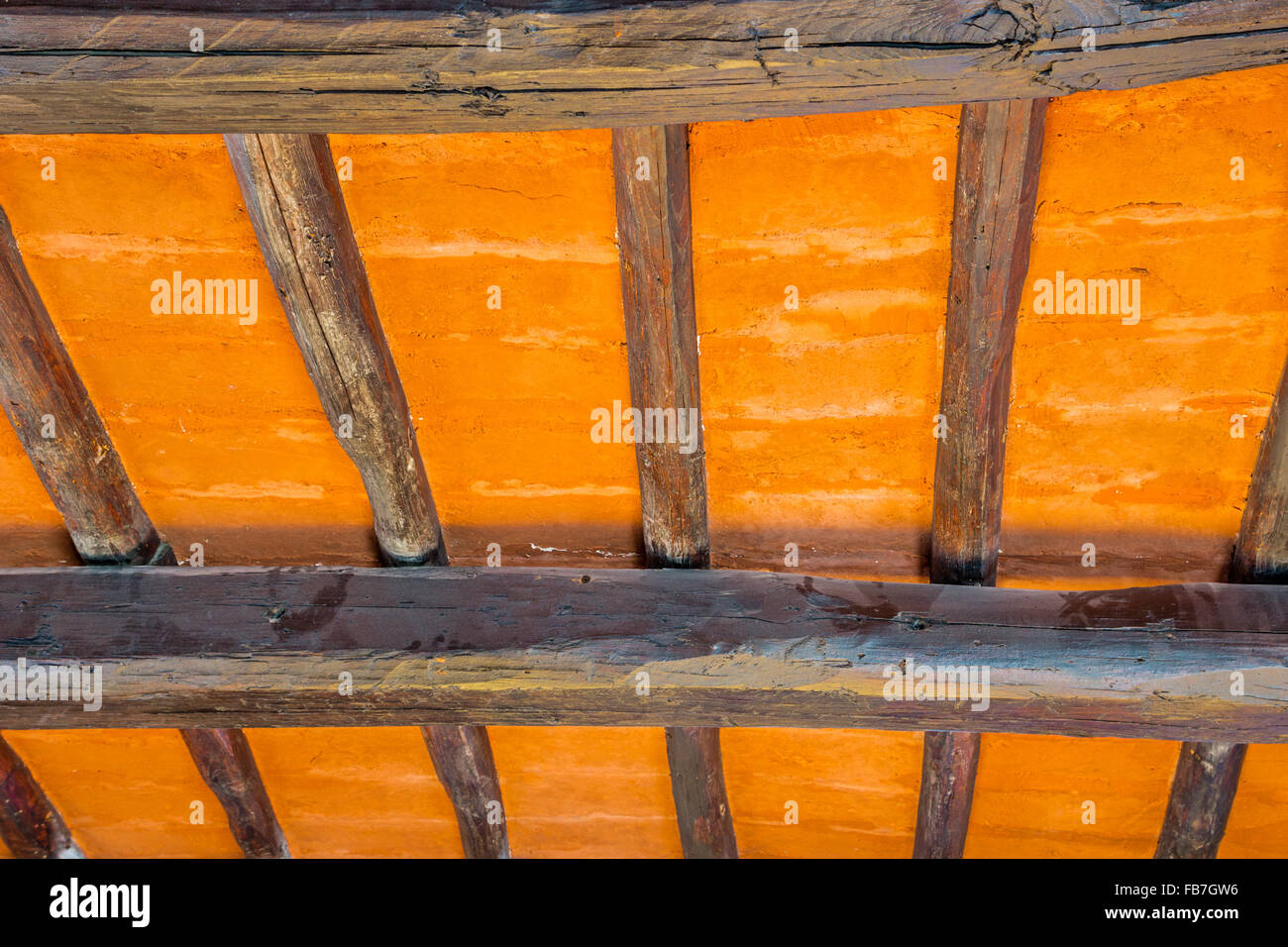 details of ancient ceiling with wooden beams and orange stone Stock ...
