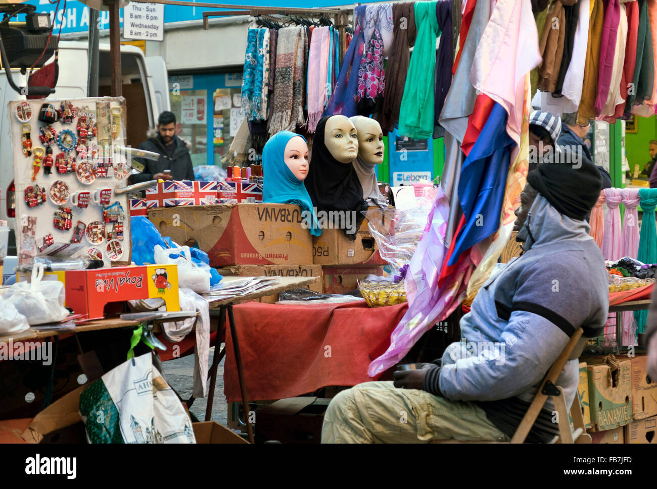Market stall selling scarves and trinkets Brixton South London Stock ...