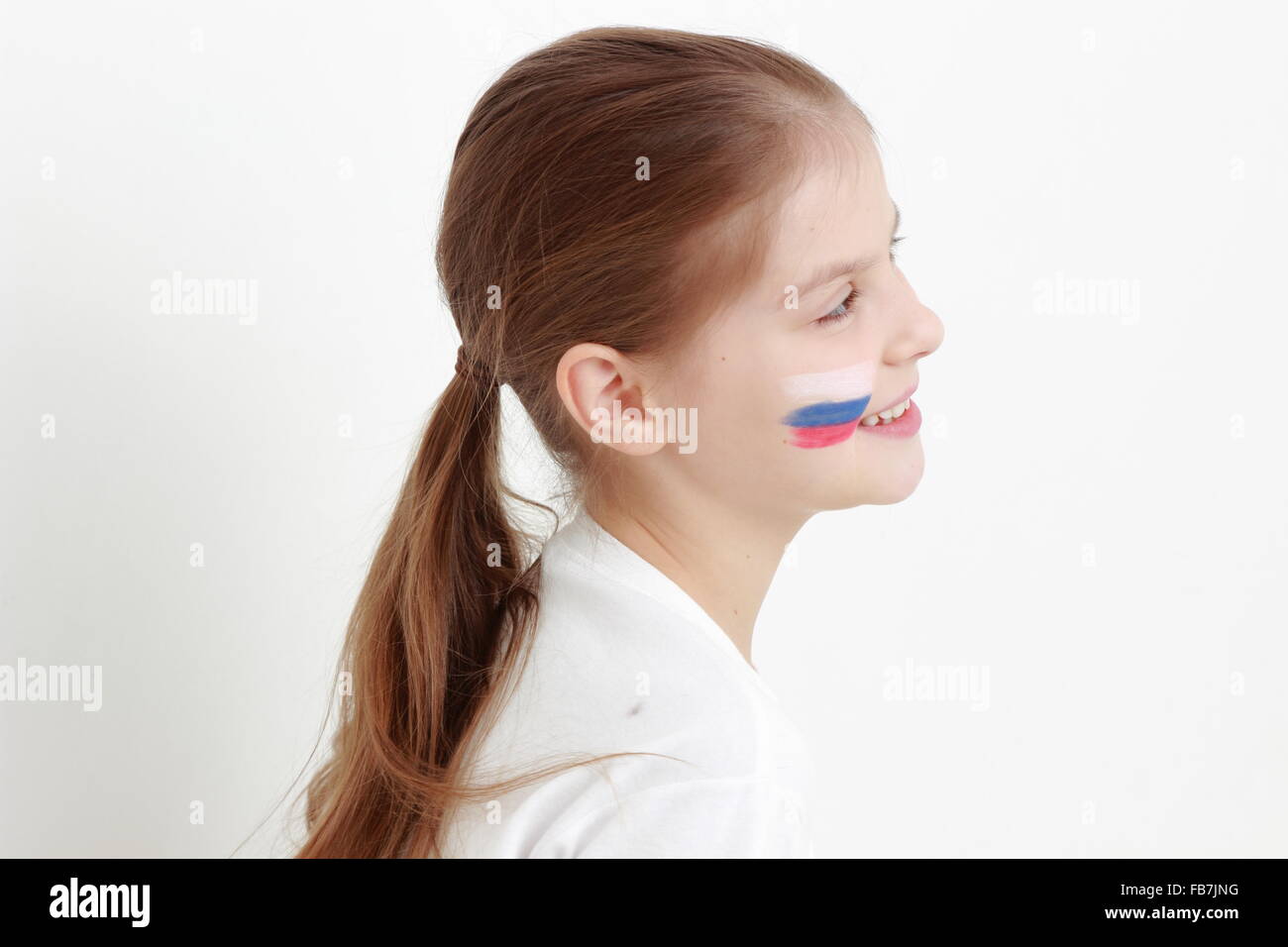 Smiley happy little girl with Russian flag symbol Stock Photo - Alamy