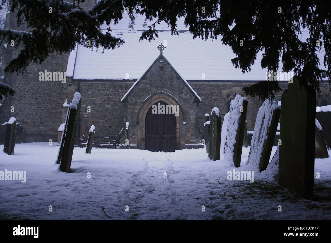 Snow in the church yard Stock Photo - Alamy
