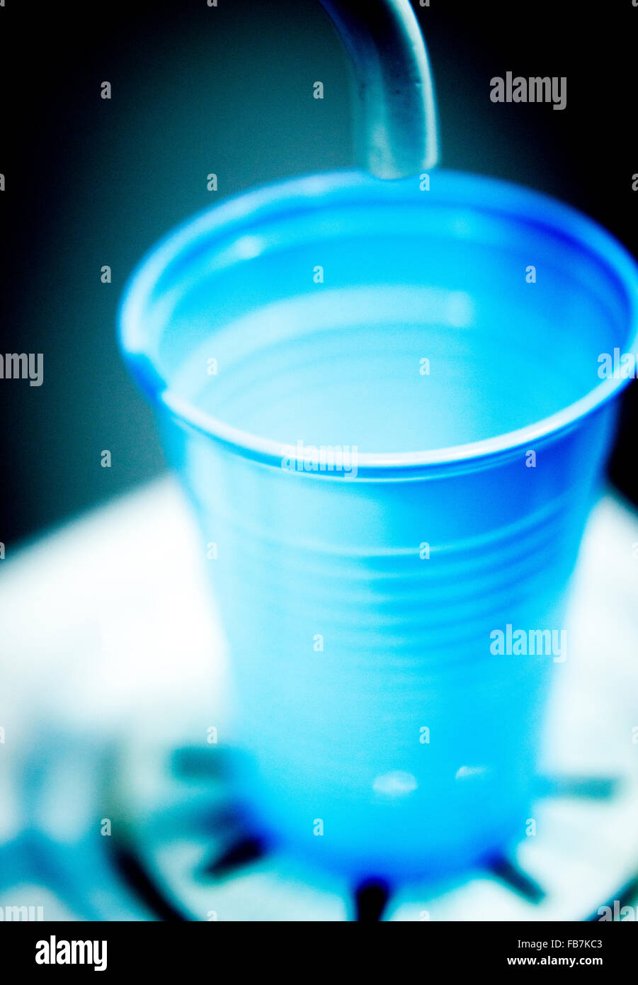 Dentists dental rinse tap and cup in clinic photo Stock Photo - Alamy