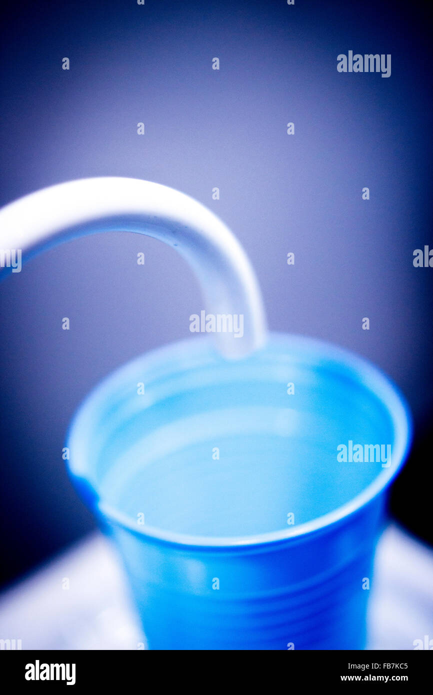 Dentists dental rinse tap and cup in clinic photo Stock Photo - Alamy