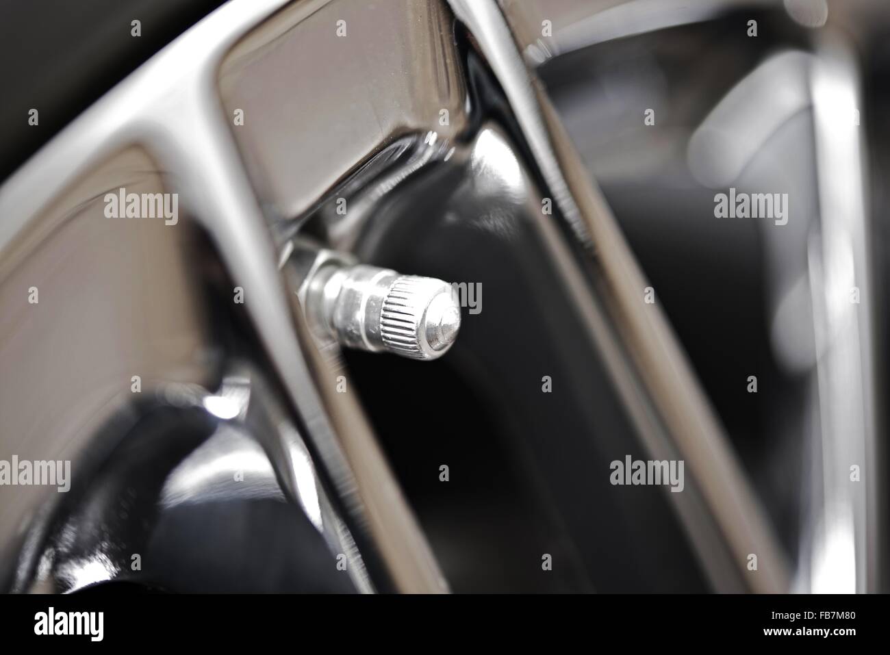 Tyre Valve and the Chrome Rim. Tyre Valve Closeup Photo Stock Photo - Alamy