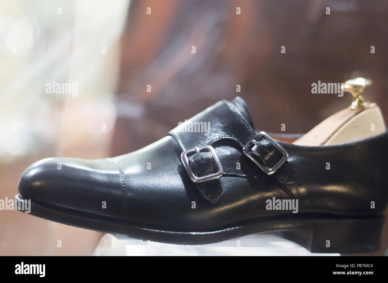 Shoe retail store men's shoes on display in shop window photo Stock ...